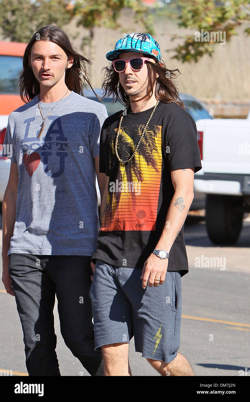 Cisco Adler (right) and a male companion arriving at annual labor ...
