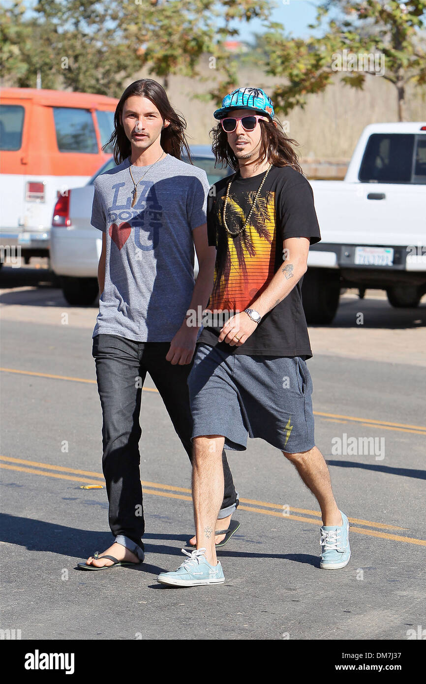 Cisco Adler (right) and a male companion arriving at annual labor ...