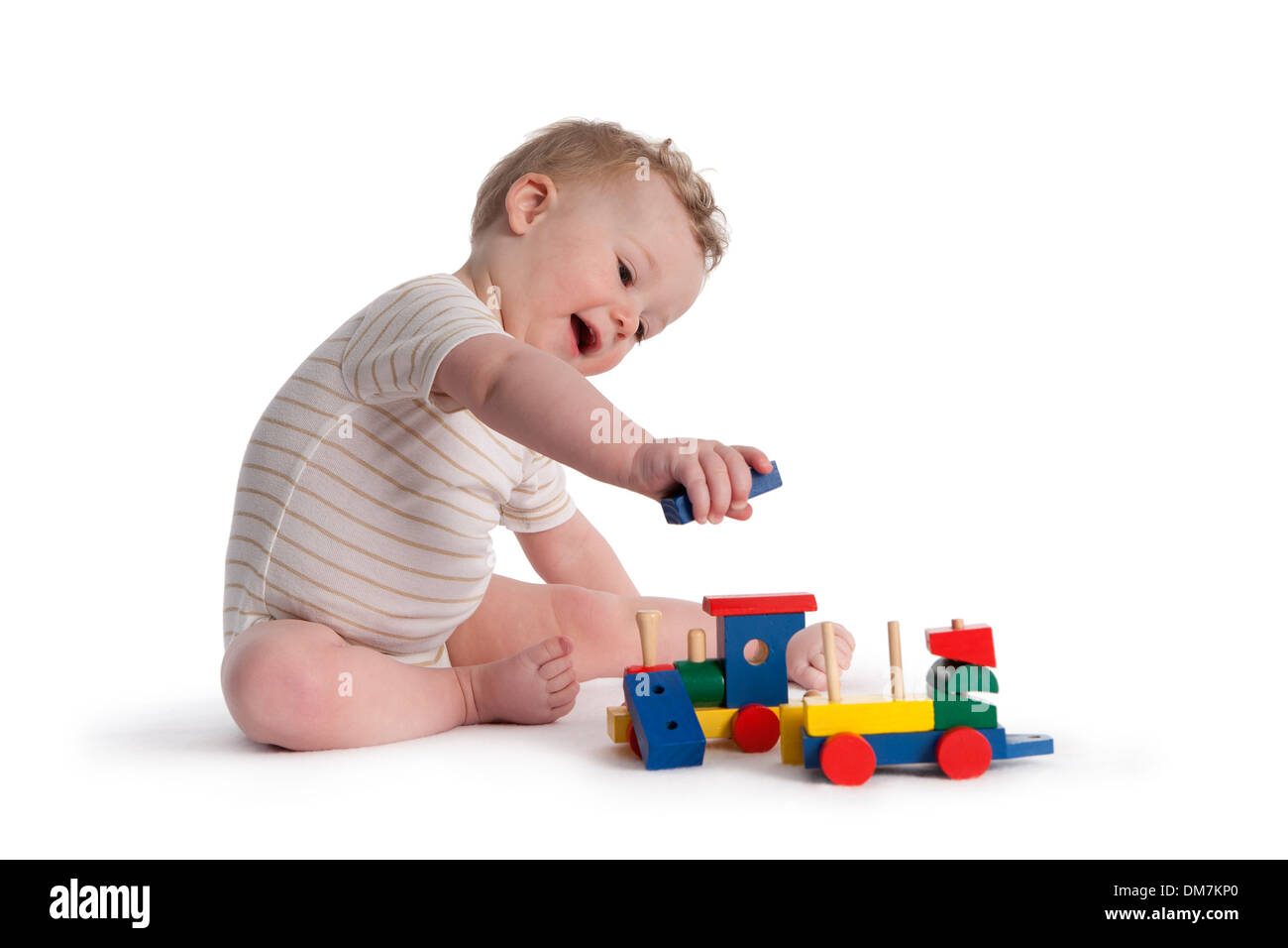 Baby boy playing with blocks on white background Stock Photo - Alamy