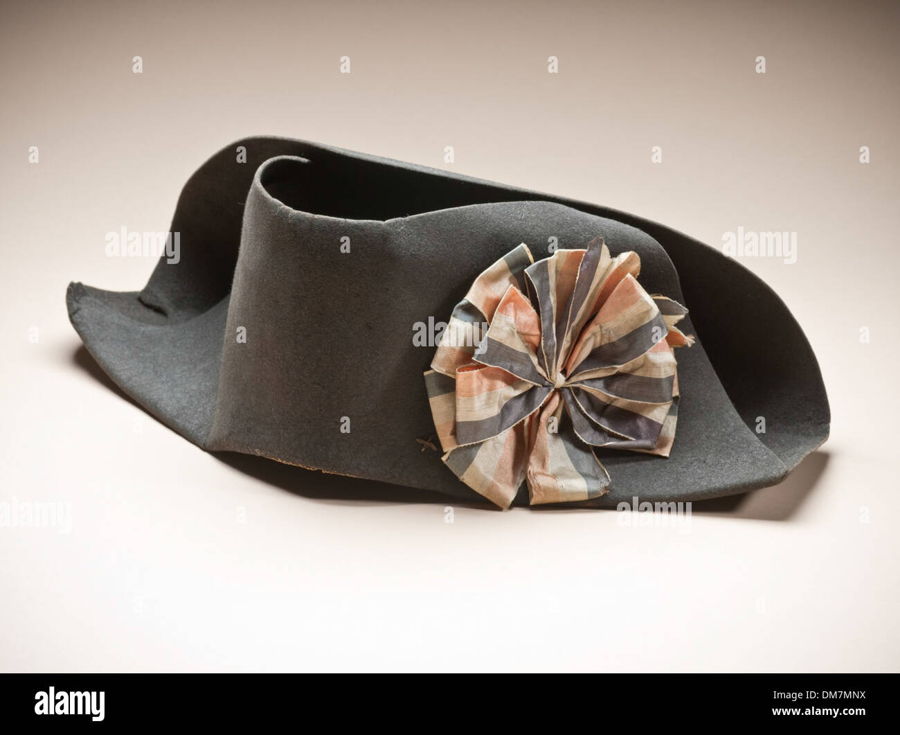 This bicorne hat, a staple of 18th-century European fashion, features a ...