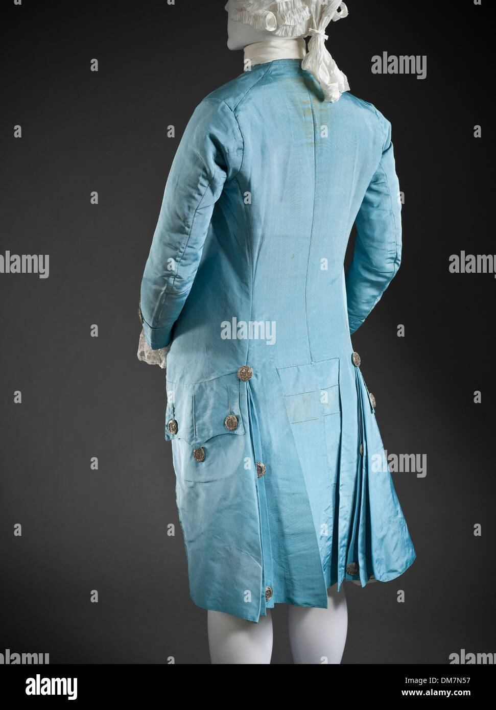 This man's suit from the 2000s showcases modern tailoring with clean ...