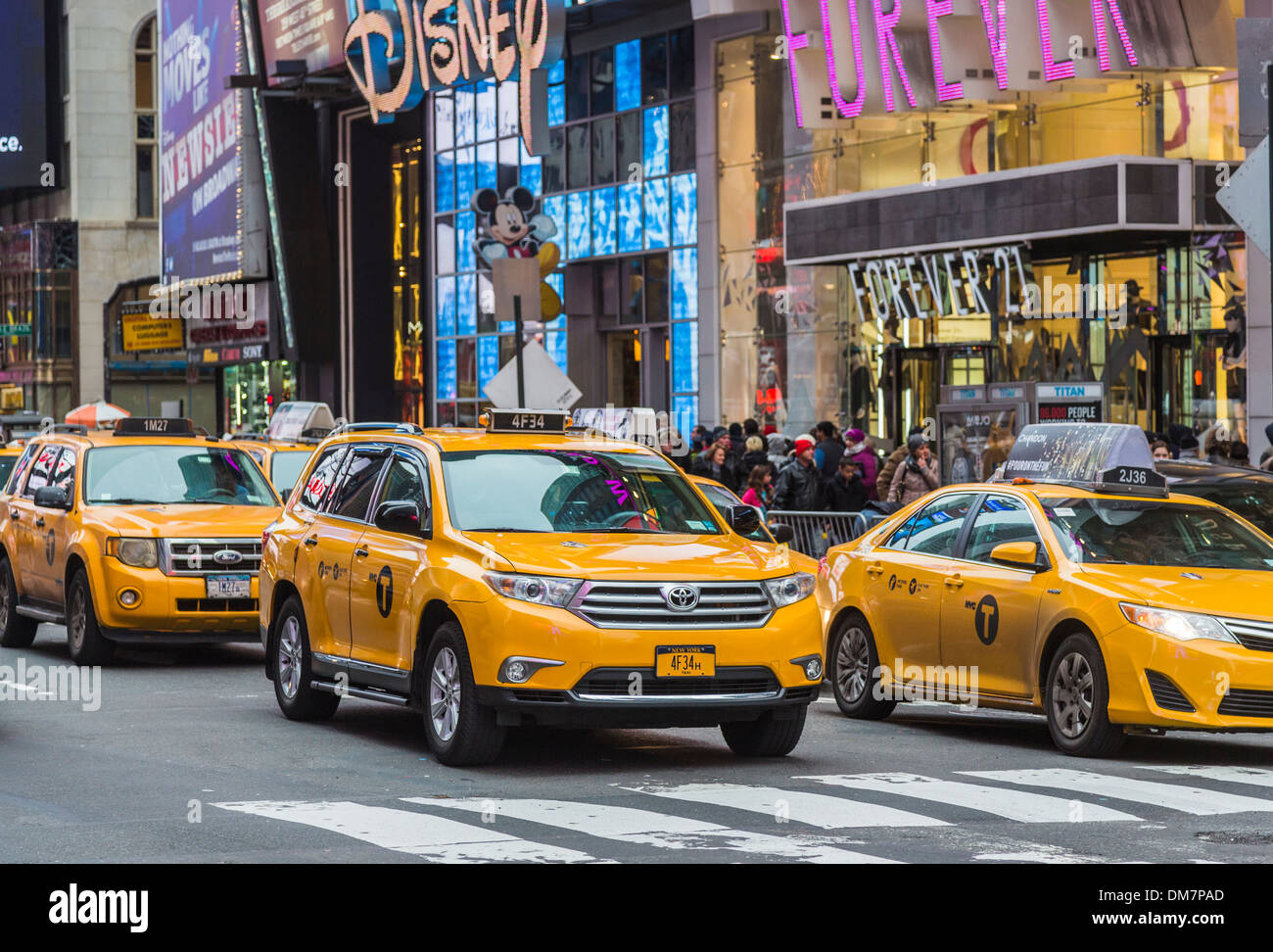 Yellow taxis in Times Square, New York Stock Photo - Alamy