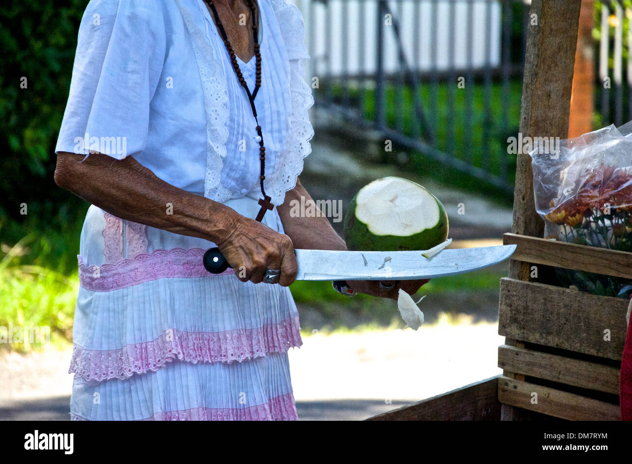 Old woman ousting long knife hi-res stock photography and images - Alamy