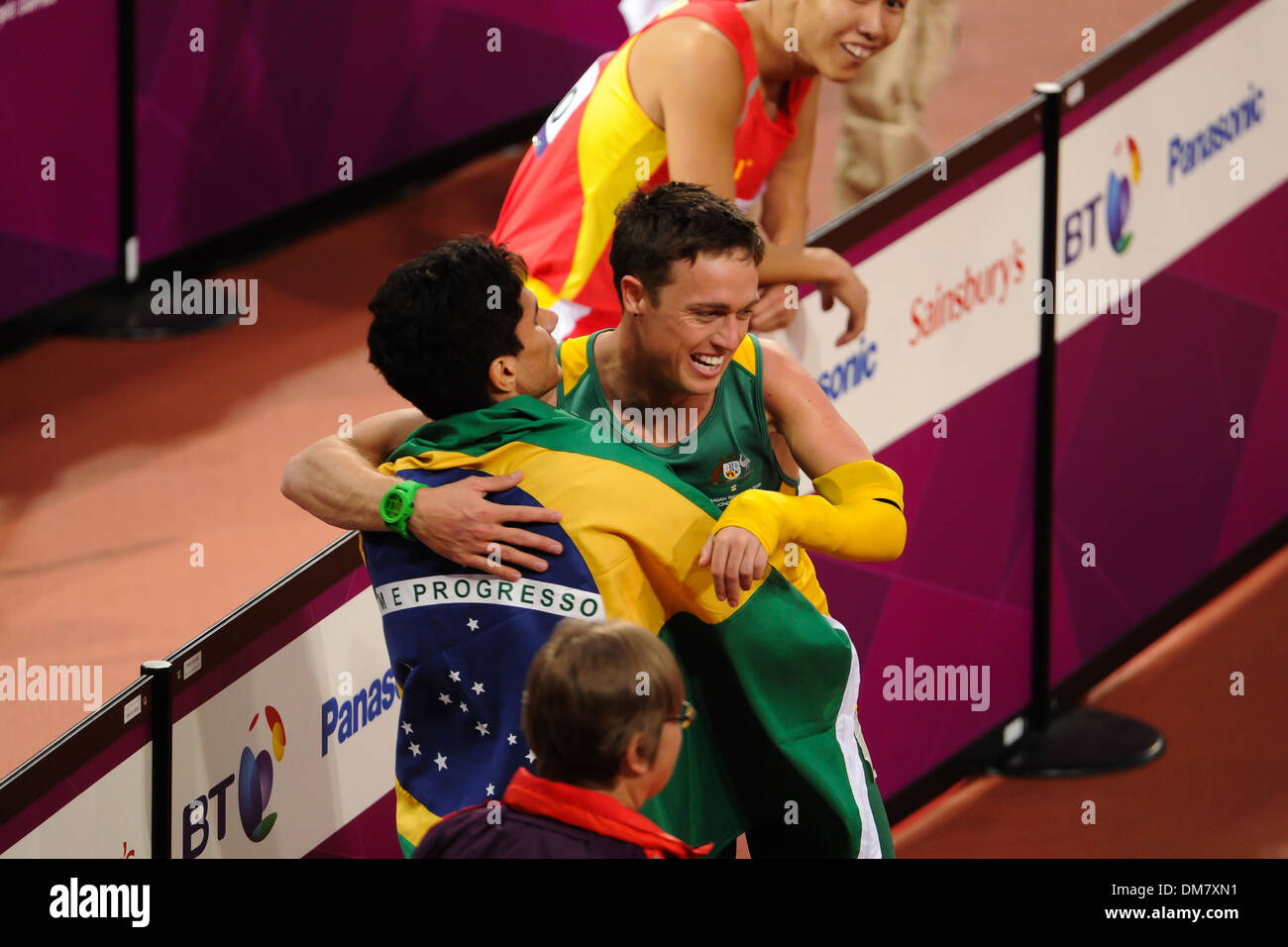 Men's 200m T46 Final Simon Patmore (AUS) is exhausted as Yohansson ...