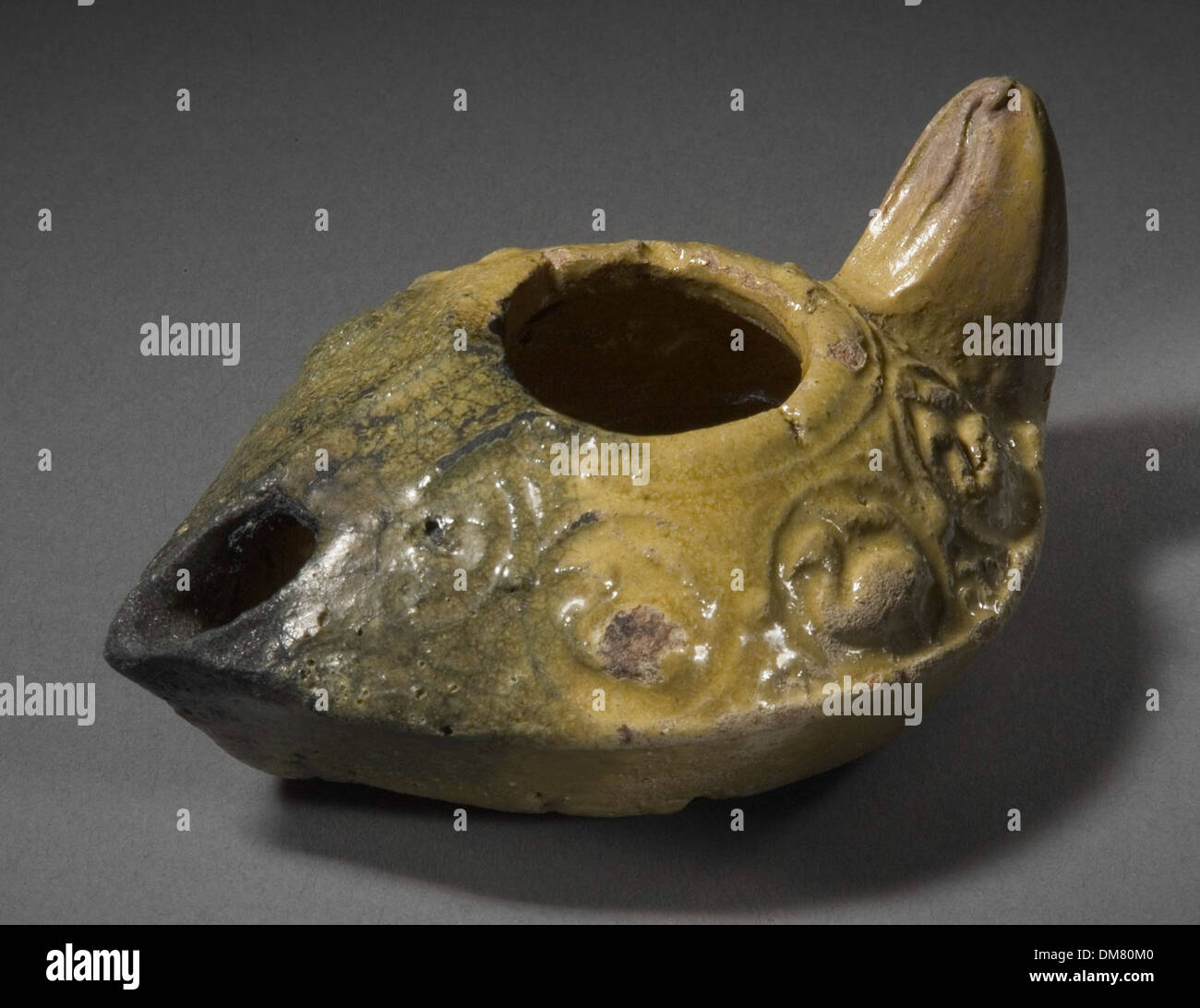 This oil lamp, captured digitally, showcases its elegant design and ...