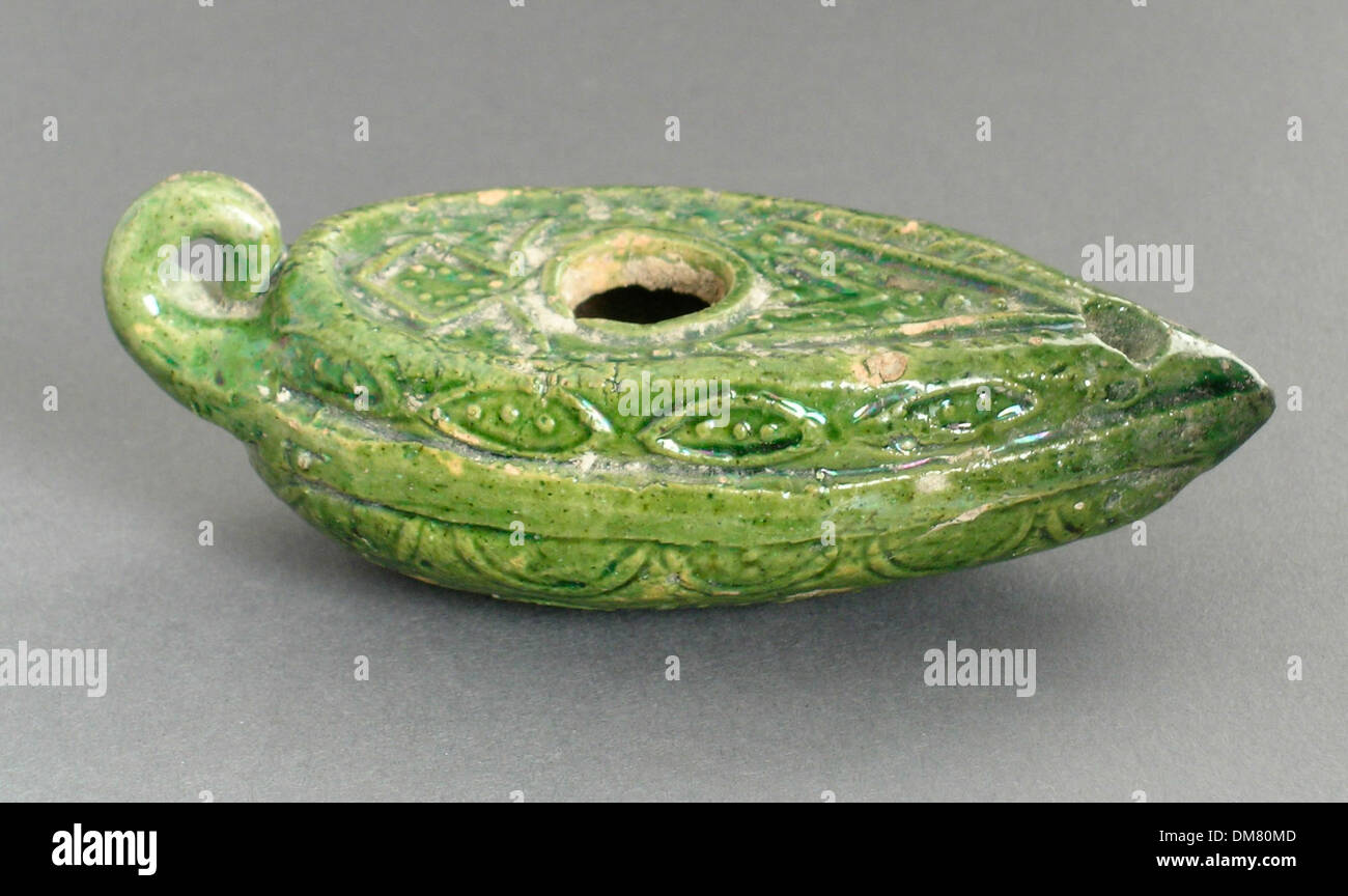 This oil lamp reflects the practical and artistic design of lighting ...