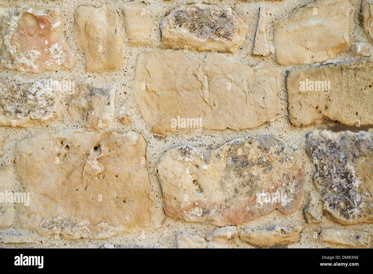 Antique wall of old rough stone, texture background Stock Photo - Alamy