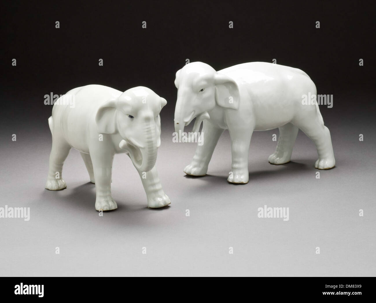 This pair of Okimono sculptures features two walking elephants ...