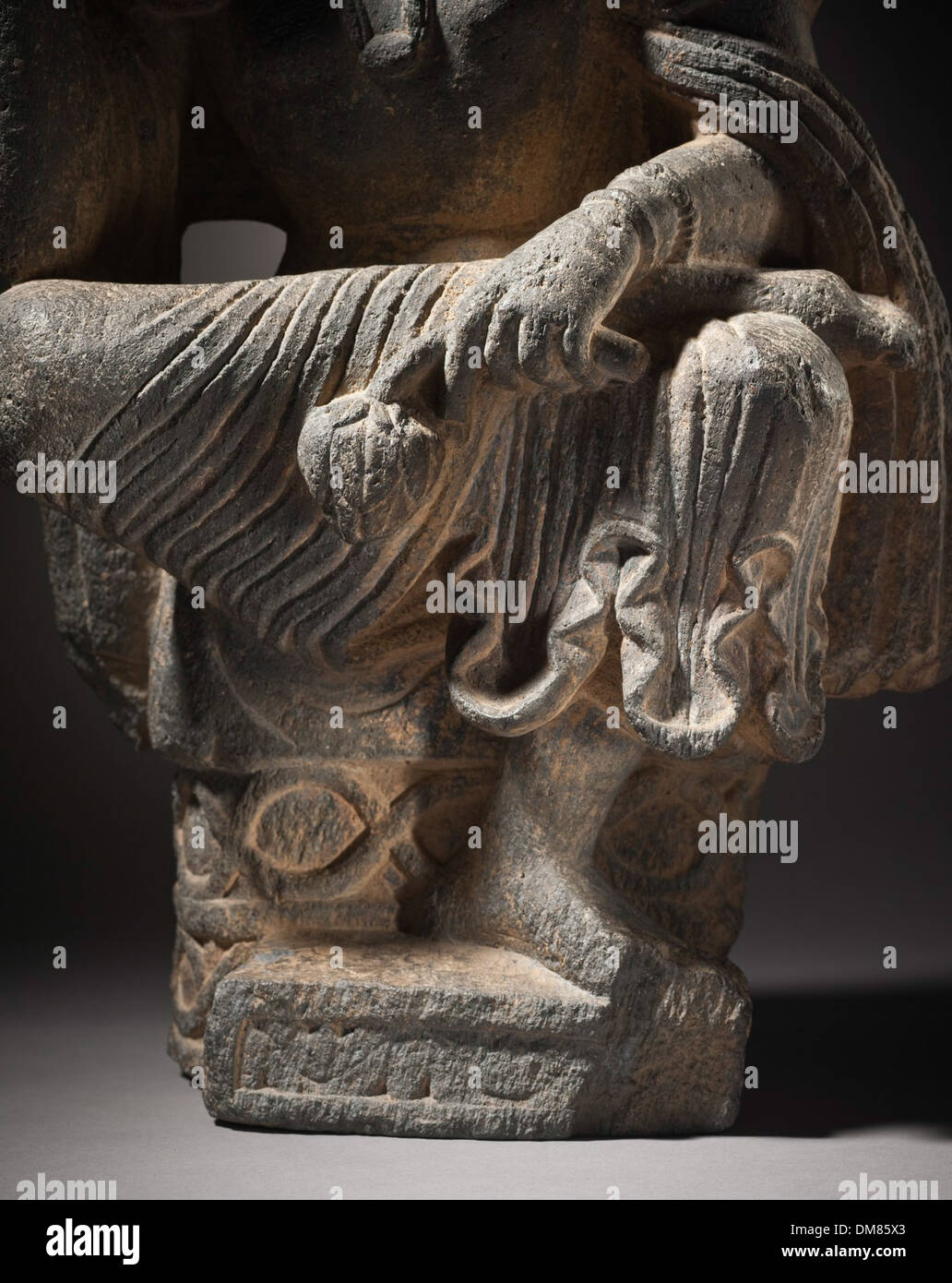 This sculpture represents a Bodhisattva in a pensive pose, symbolizing ...