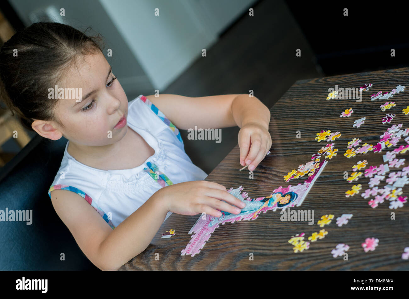 Child and puzzle Stock Photo - Alamy