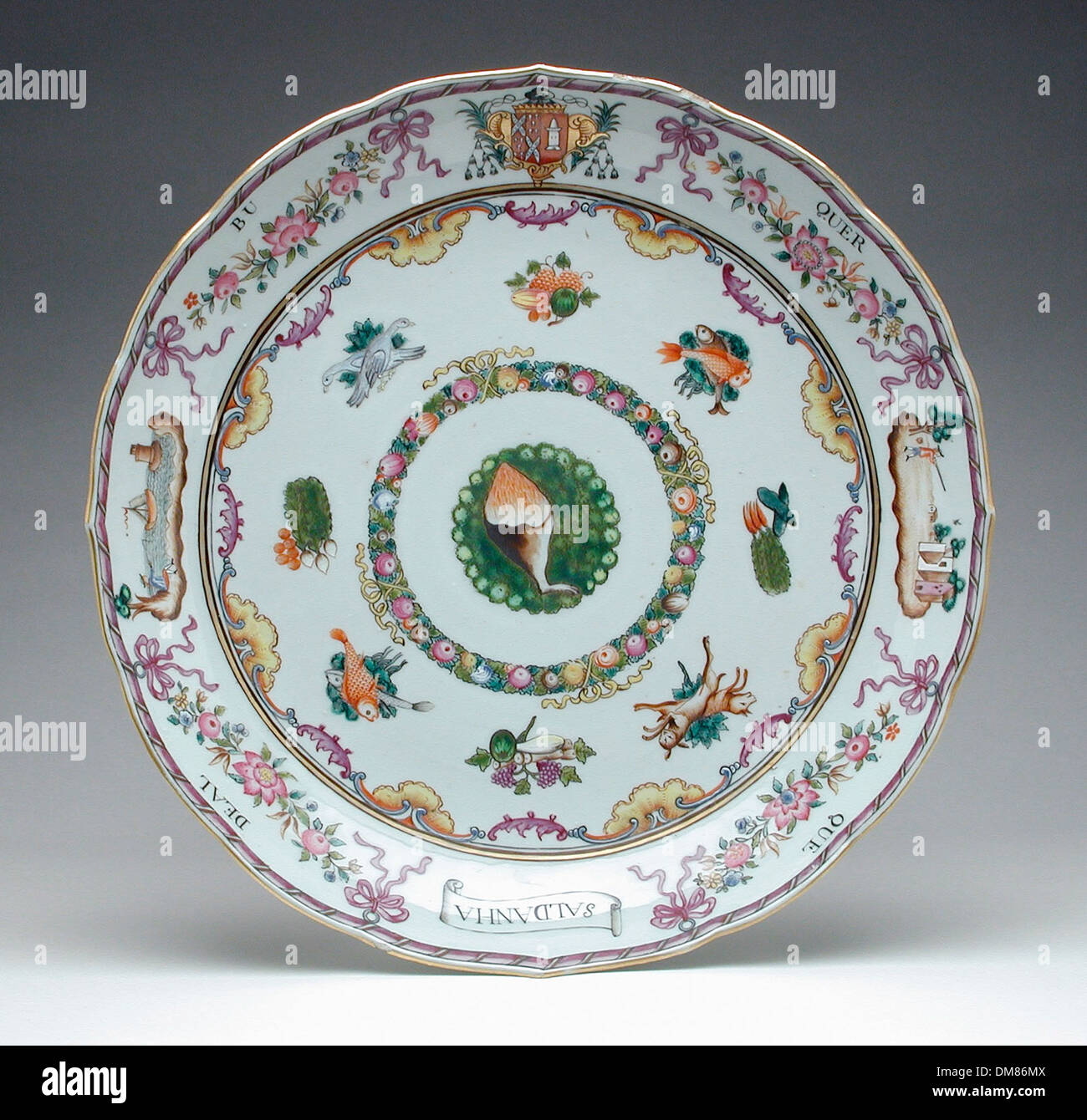 This collection of armorial dinnerware features intricate designs ...
