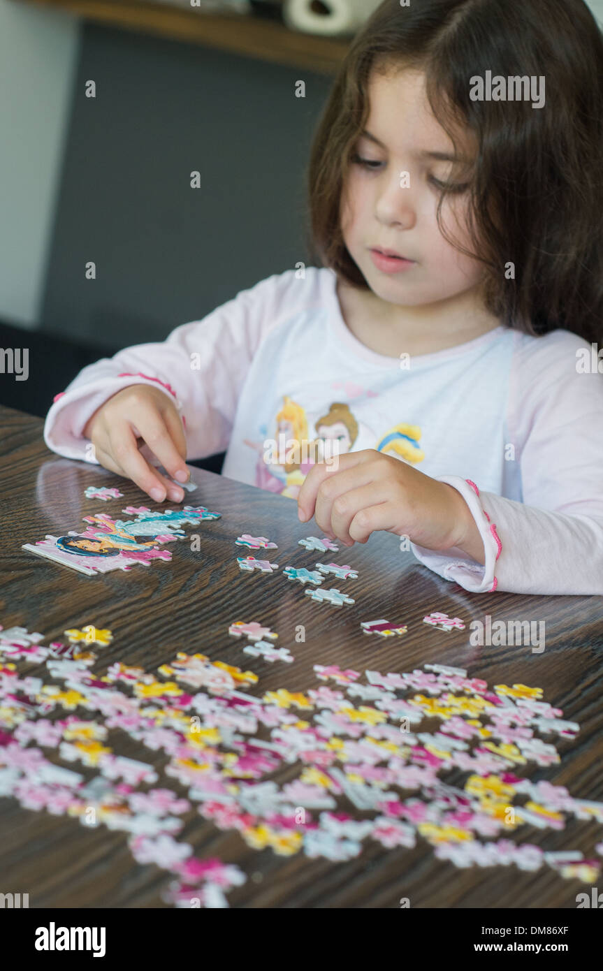 Child and puzzle Stock Photo - Alamy