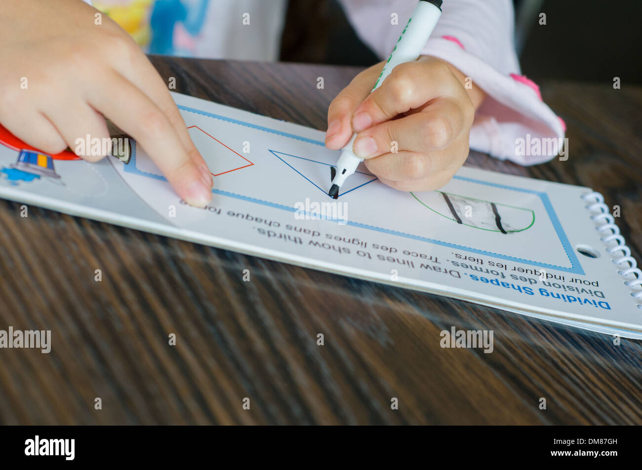 Child doing math exercises Stock Photo - Alamy