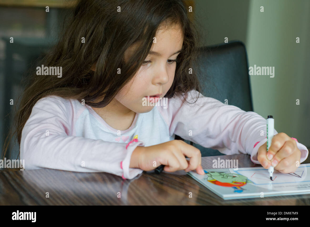 Girl child drawing home hi-res stock photography and images - Alamy