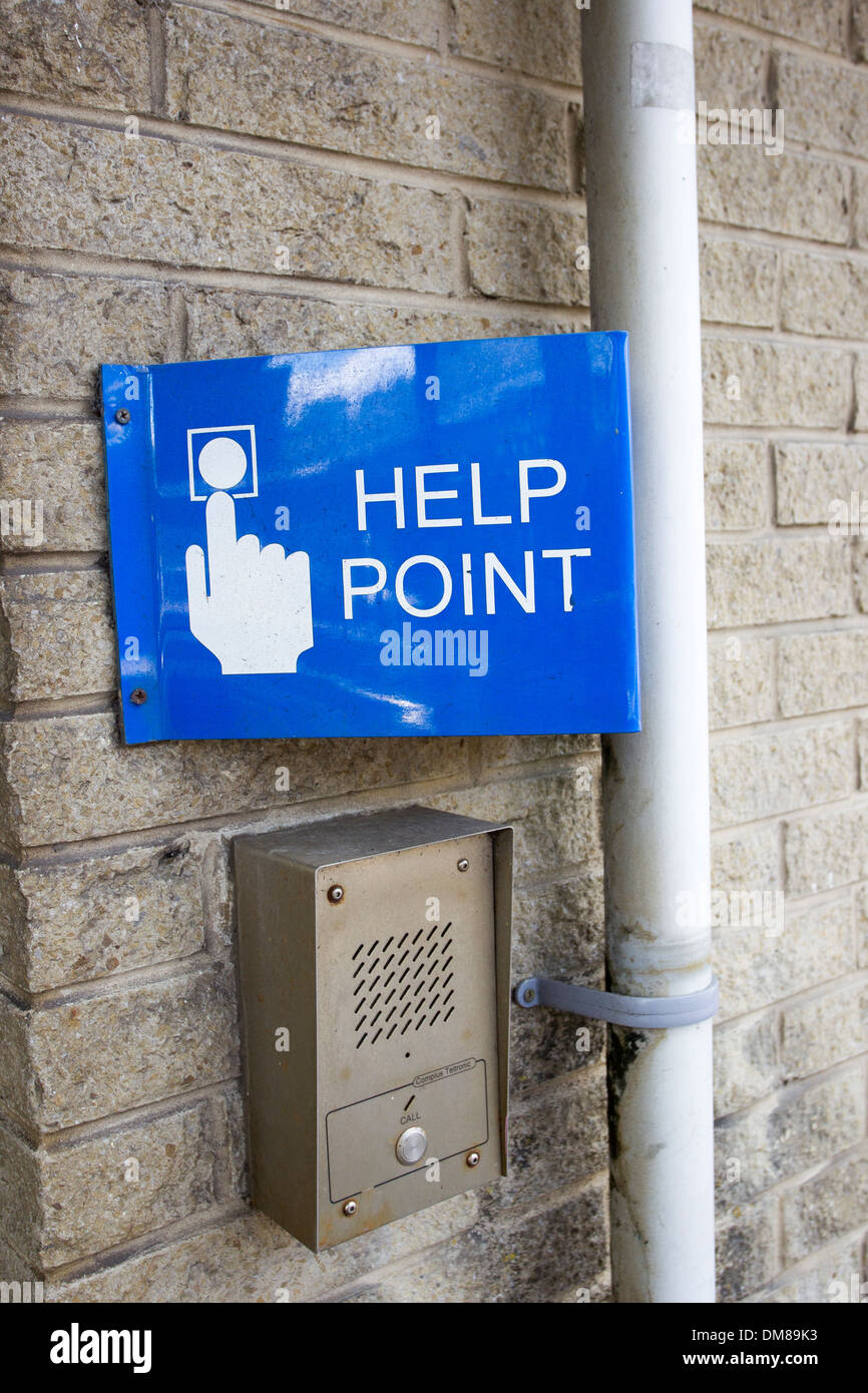 Help point sign button and speaker on train platform Stock Photo - Alamy