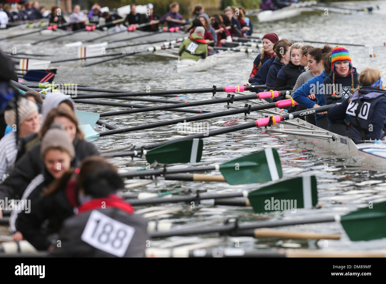 CAMBRIDGE AND OXFORD UNIVERSITY ROWING CREWS ON THE RIVER CAM IN ...
