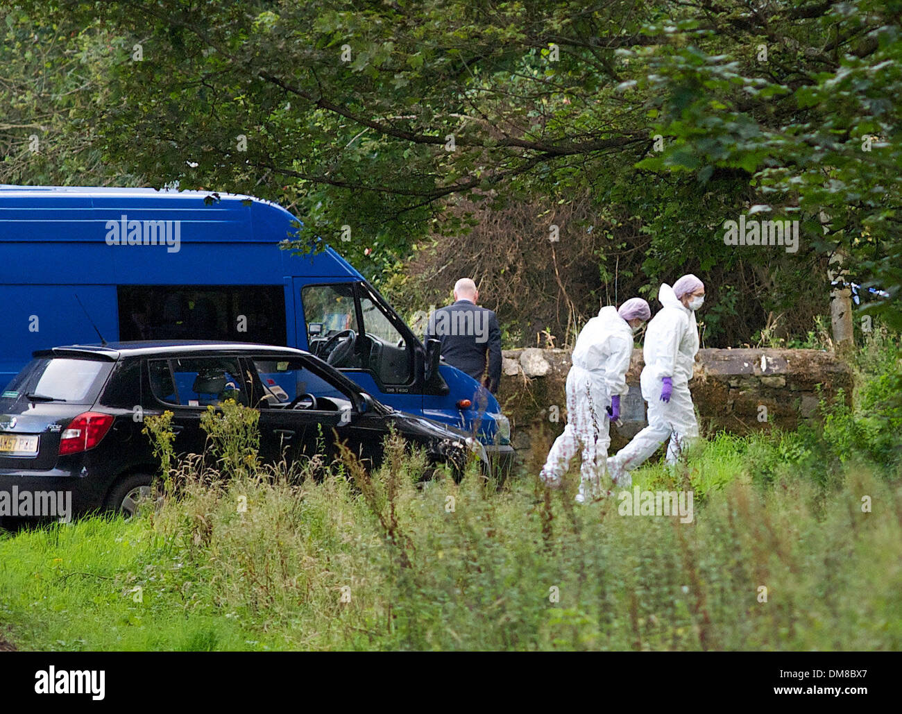 Police and scene of crime officers arrive at site where a body was ...