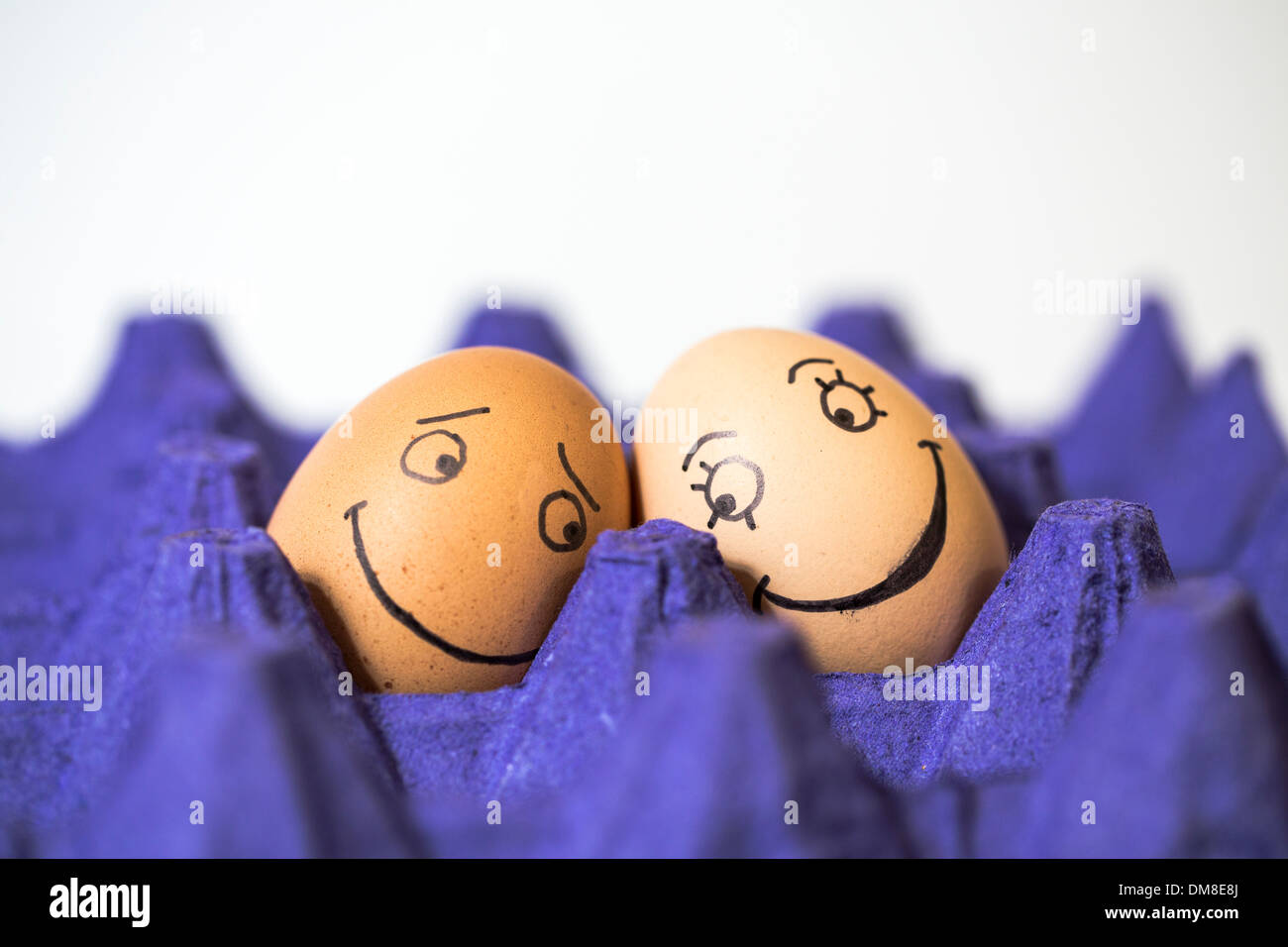 Two eggs faces hi-res stock photography and images - Alamy