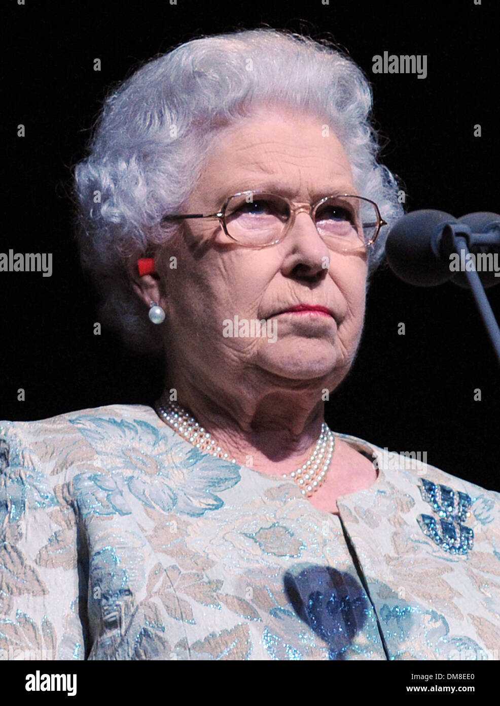 Queen Elizabeth II wearing ear plugs officially opens the London ...
