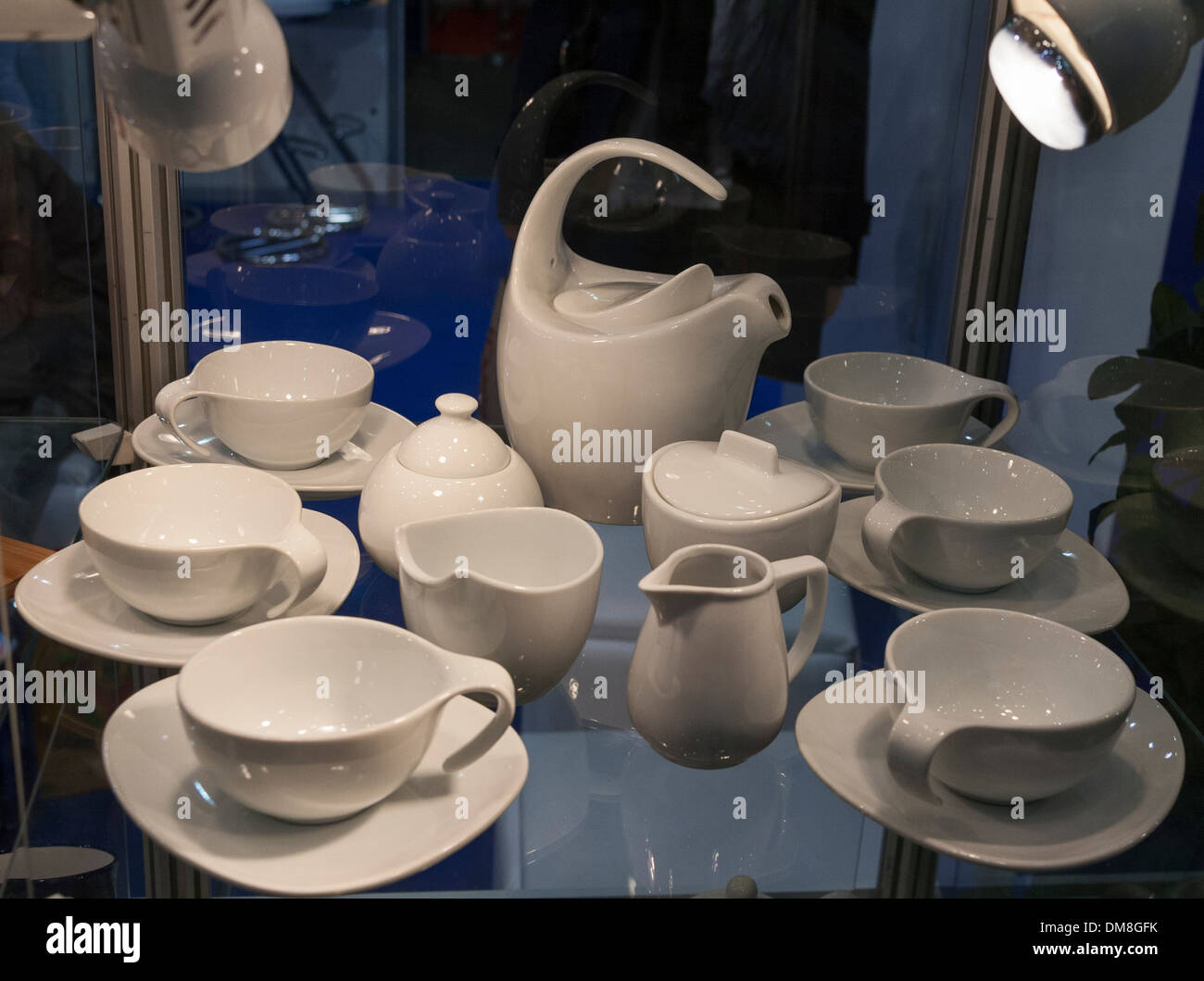 Porcelain tea set on glass showcase Stock Photo - Alamy