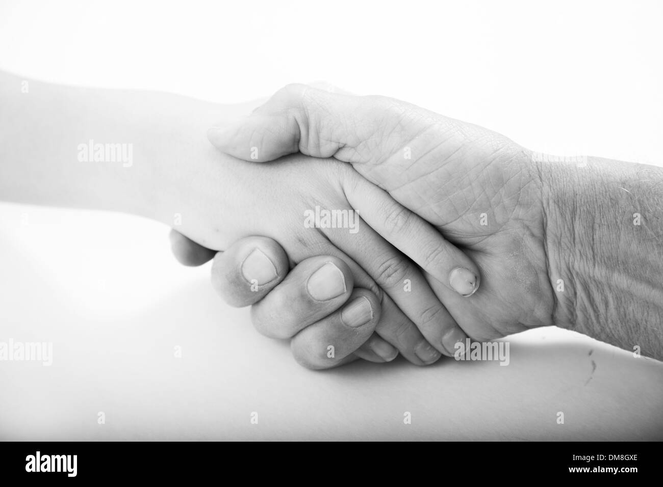 Interlocking hands hi-res stock photography and images - Alamy