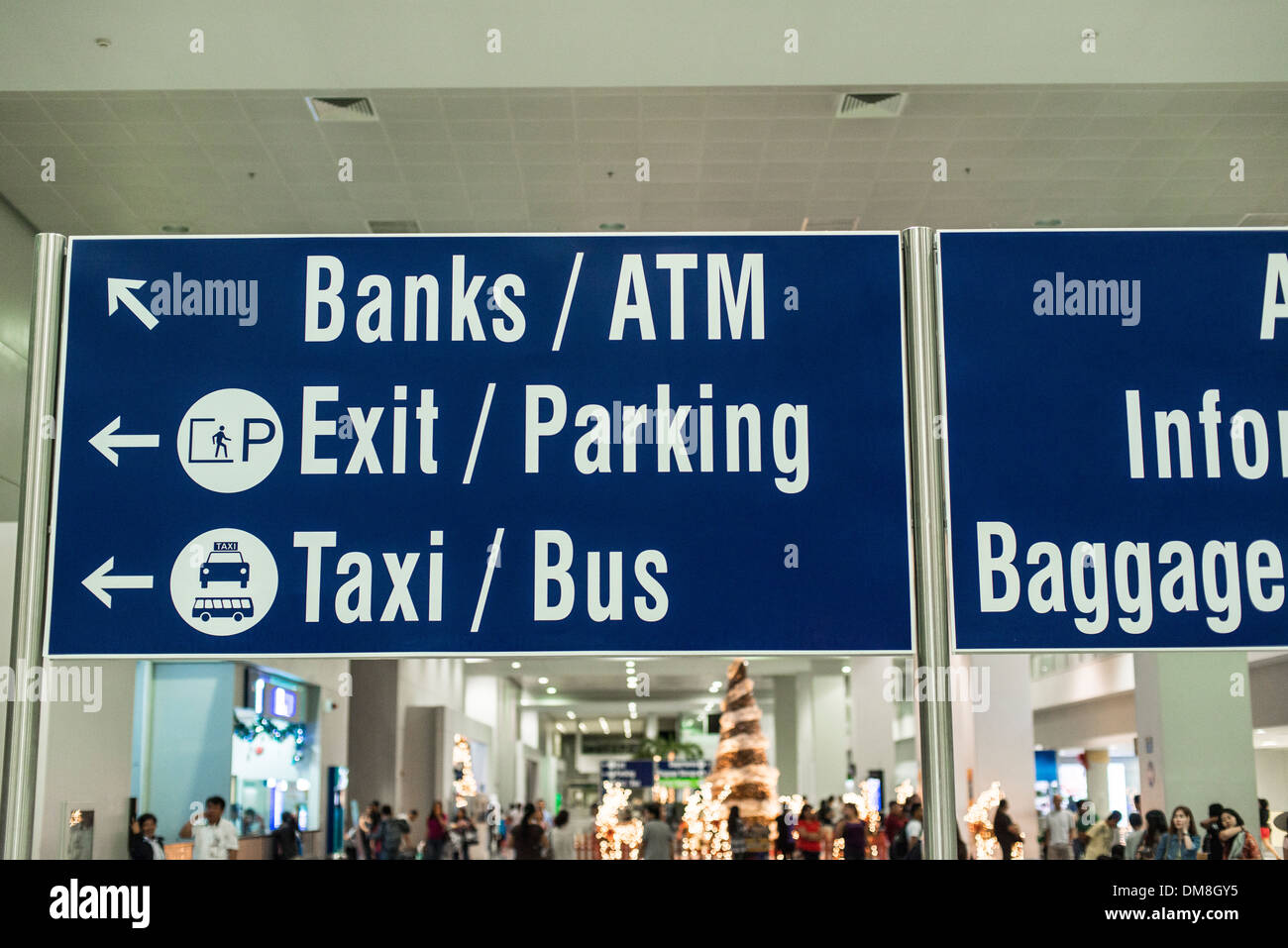 Direction sign for banks, atm, exit, parking, taxi and bus on Manila ...