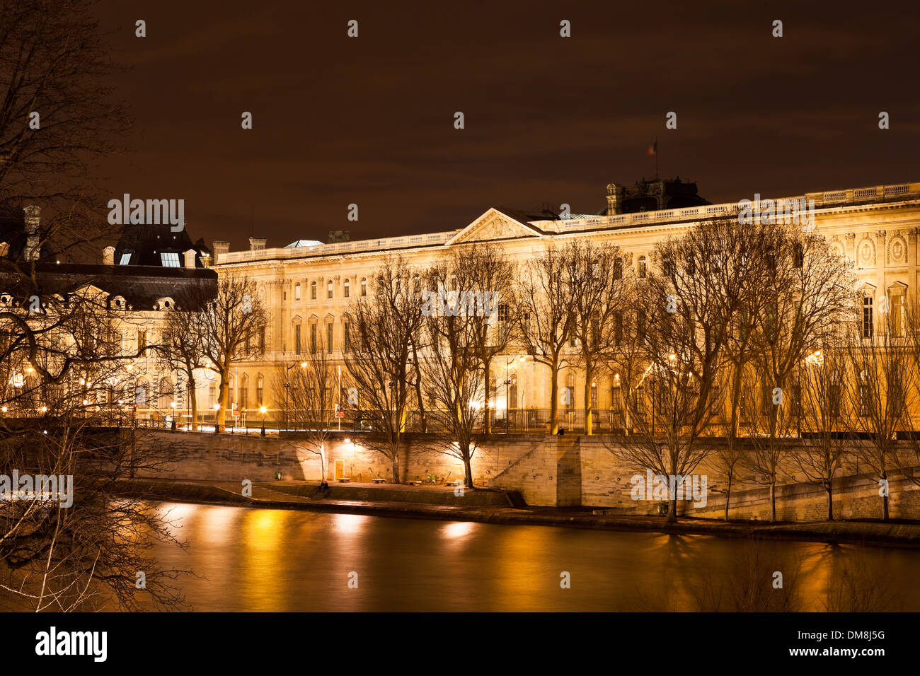quai du louvre in Paris at night Stock Photo - Alamy