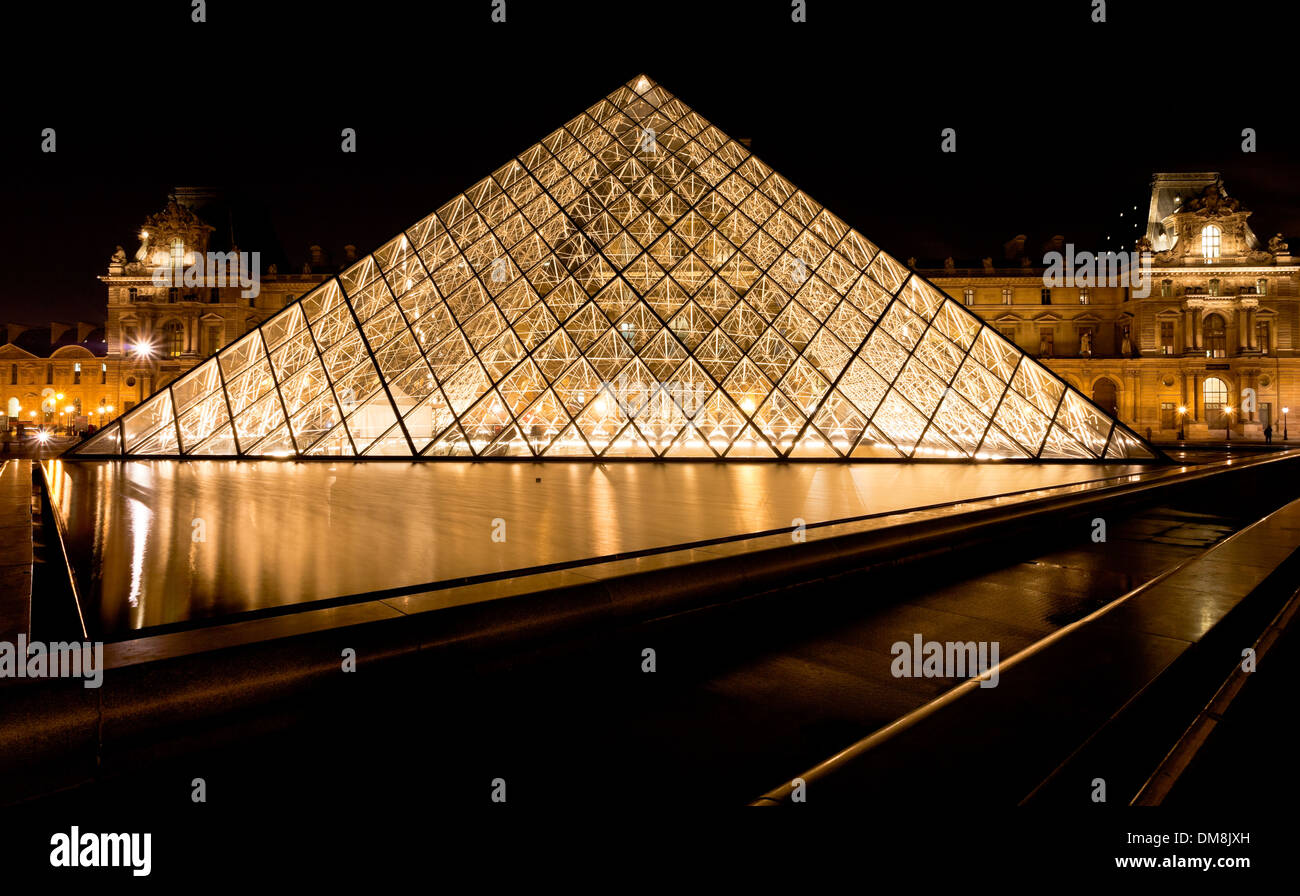 The Louvre Palace and the Pyramid, Paris at night Stock Photo - Alamy