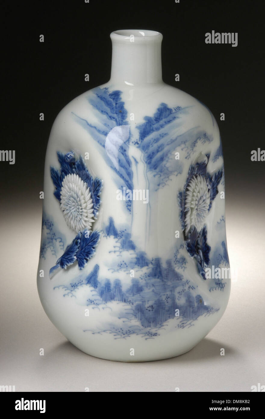 Sake flask tokkuri with landscape and raised chrysanthemums hi-res ...