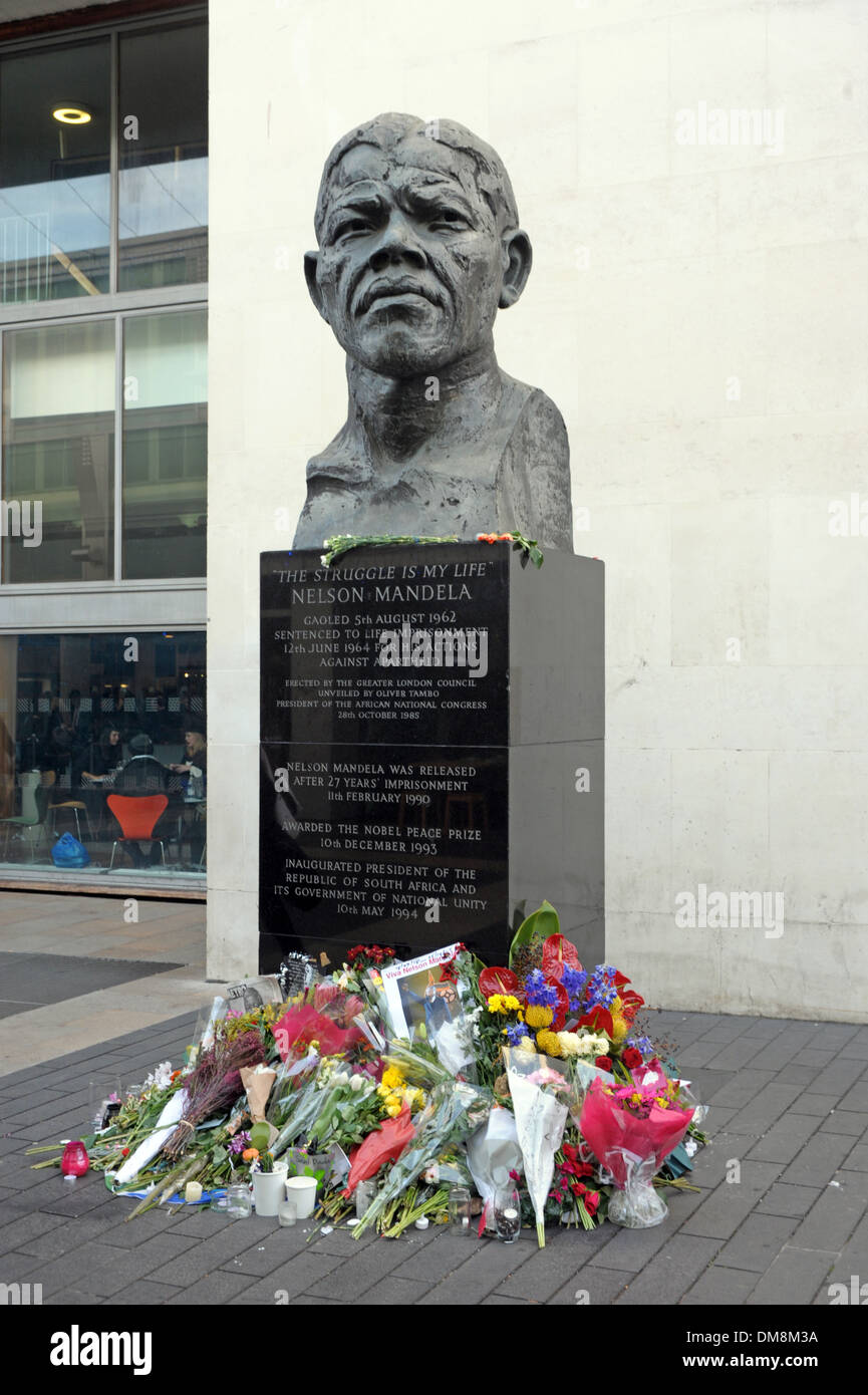 Tributes to Nelson Mandela at his statue Royal Festival Hall London ...