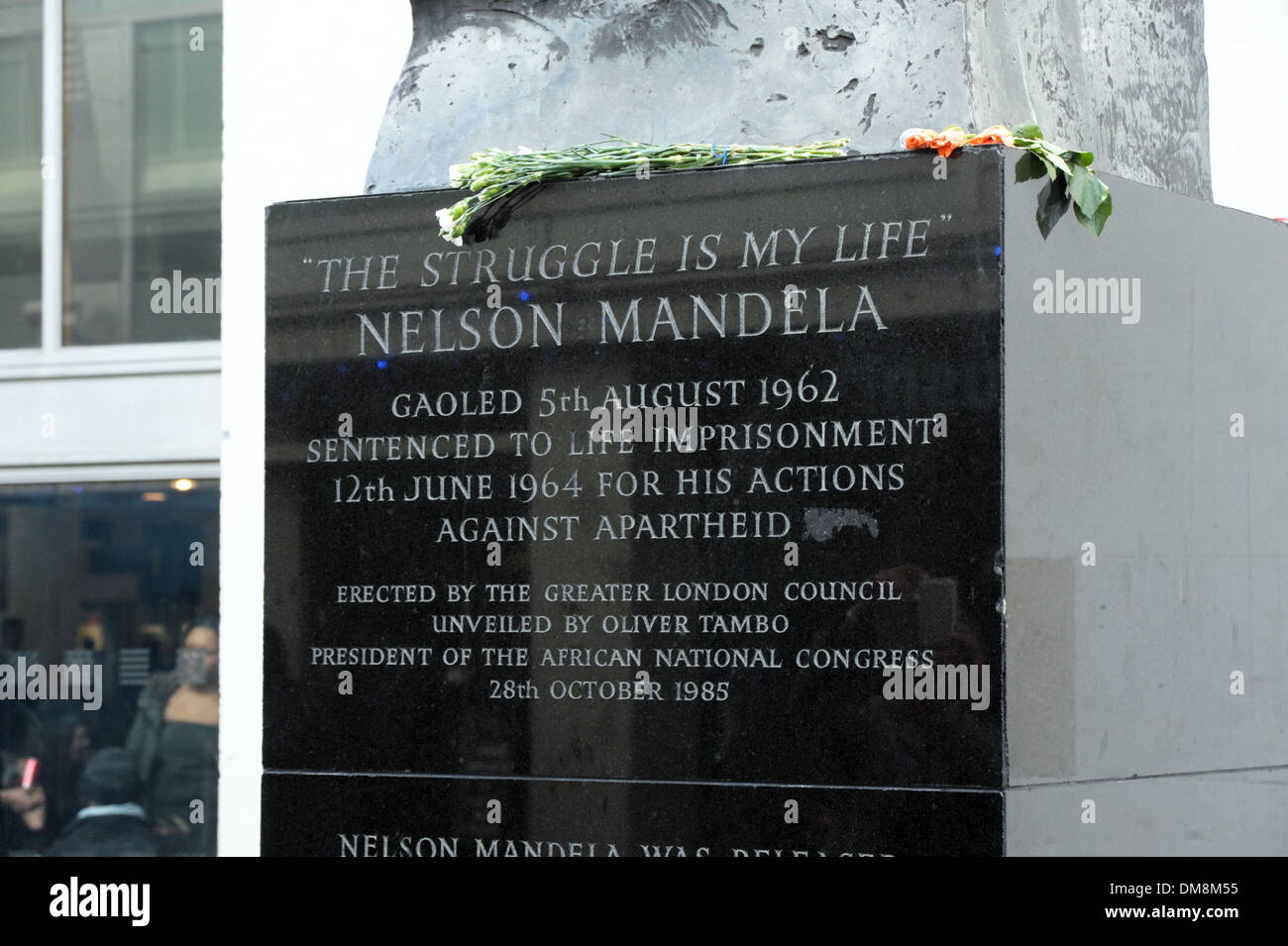 Tributes to Nelson Mandela at his statue Royal Festival Hall London ...