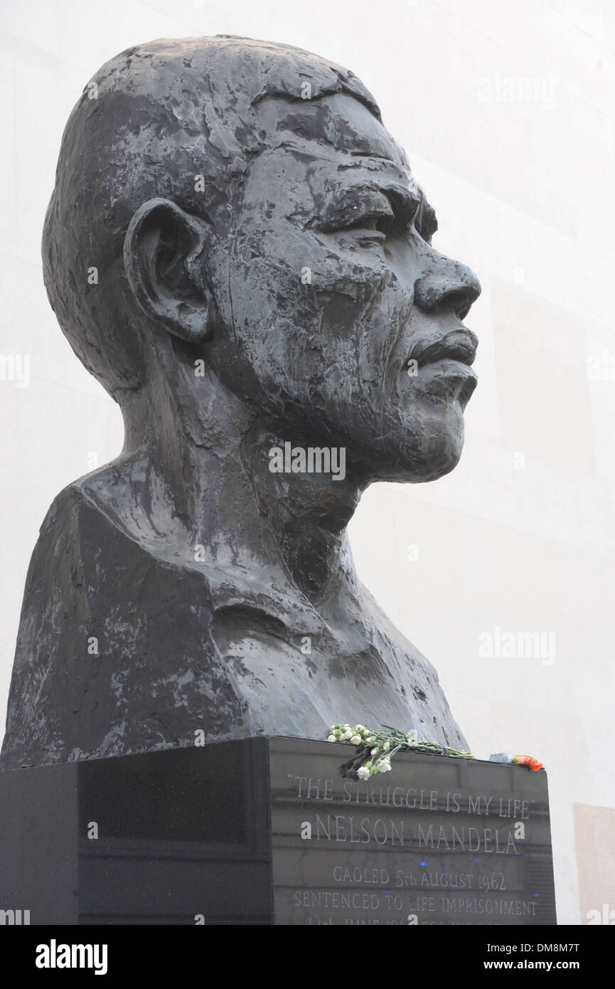 Tributes to Nelson Mandela at his statue Royal Festival Hall London ...