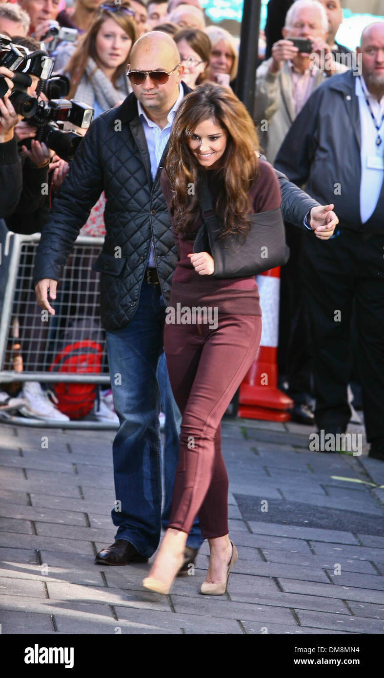 Cheryl Cole With Her Arm In A Sling Following Her Recent Car Accident Arriving At Bbc Radio 1