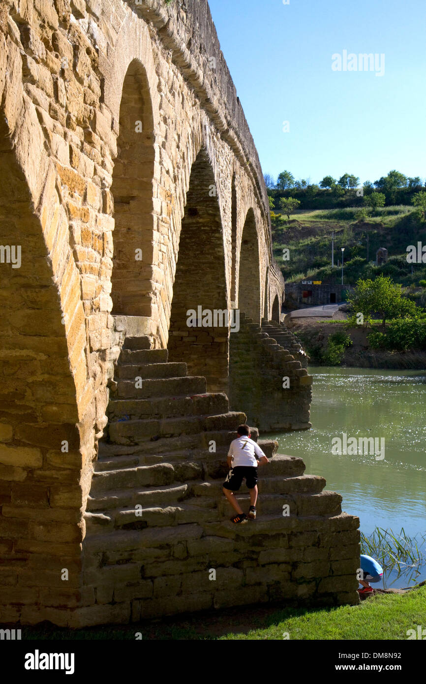 Six-arched Roman bridge spanning the Arga River on the Way of St. James ...
