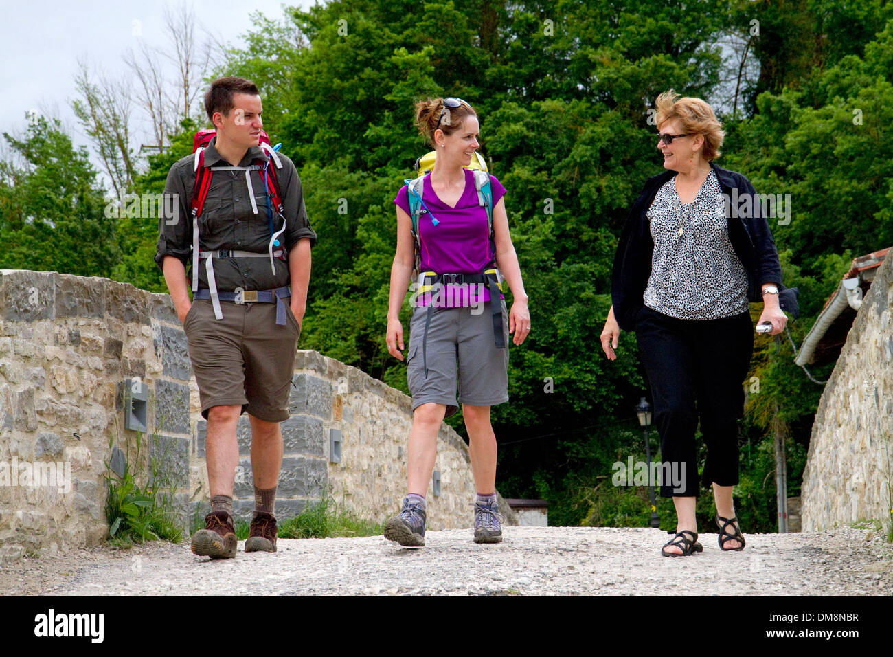 Modern day pilgrims walk along the Camino De Santiago, the Way of St ...