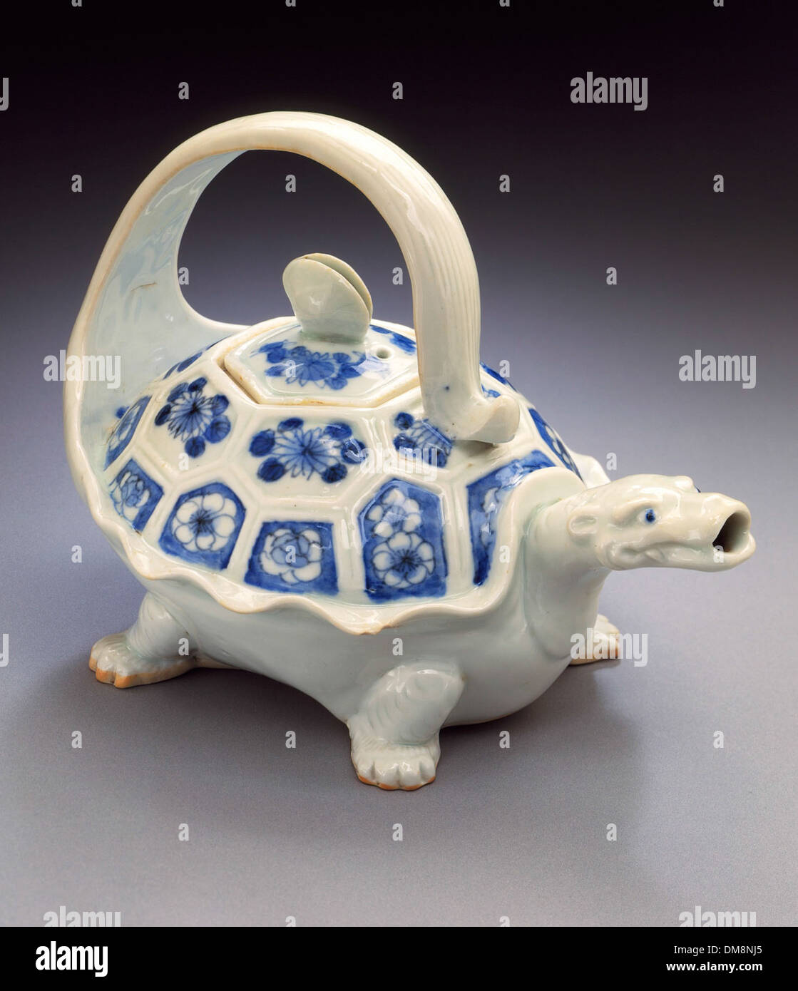 This sencha teapot, modeled as a long-tailed turtle with a clam knop ...