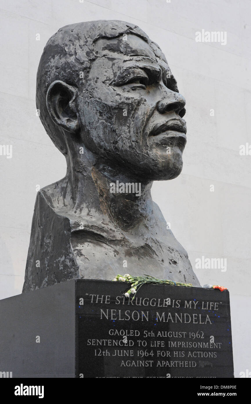 Tributes to Nelson Mandela at his statue Royal Festival Hall London ...