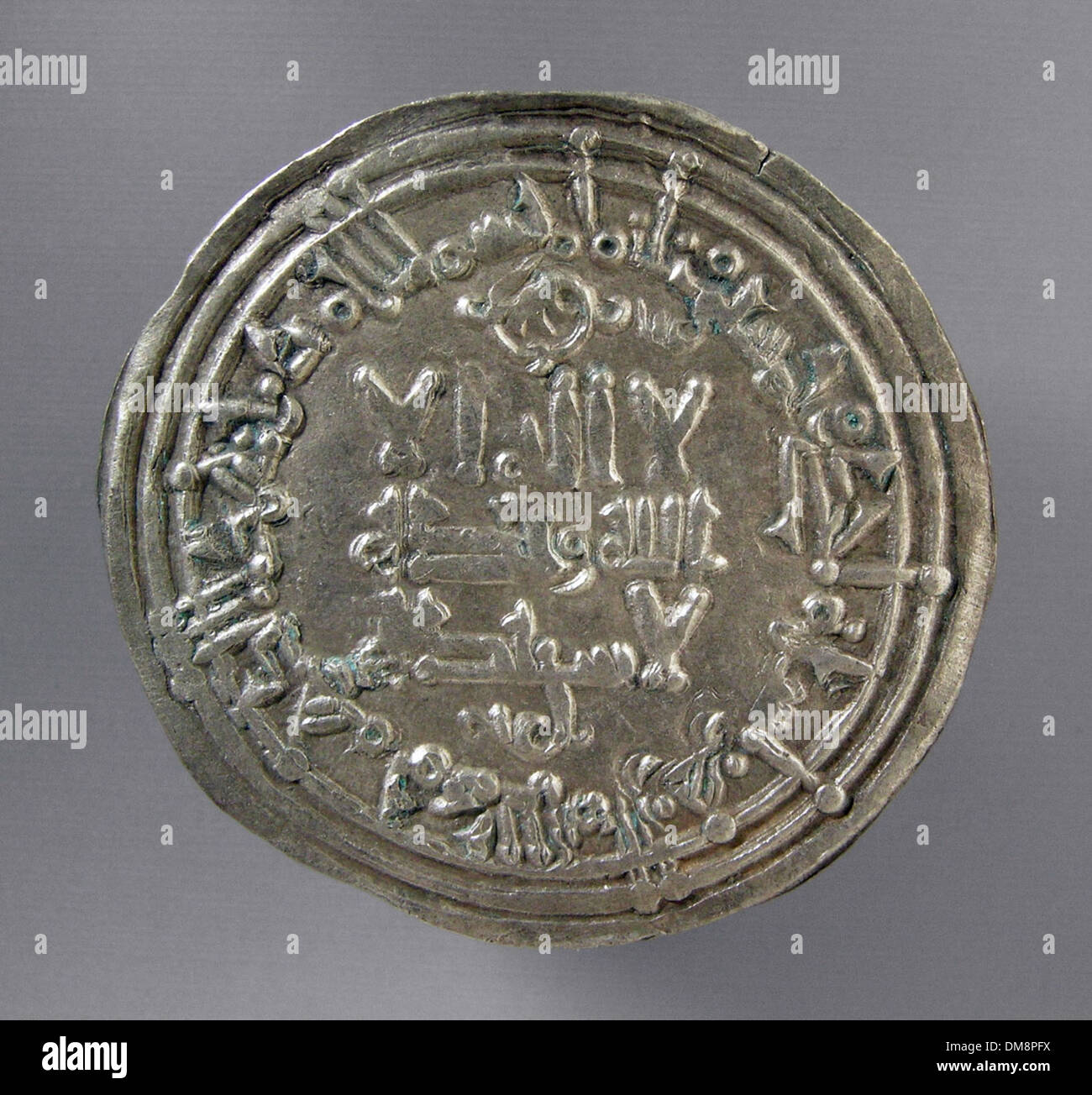 This silver dirham, part of a collection of Ancient and Islamic Art ...