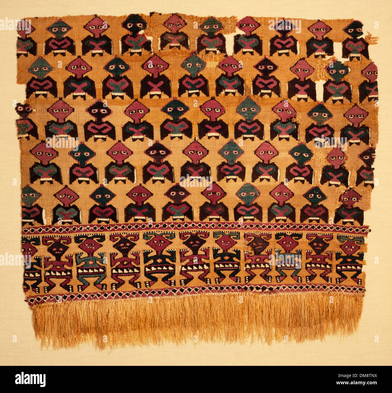 A textile fragment from the Middle East, featuring a design of stylized ...