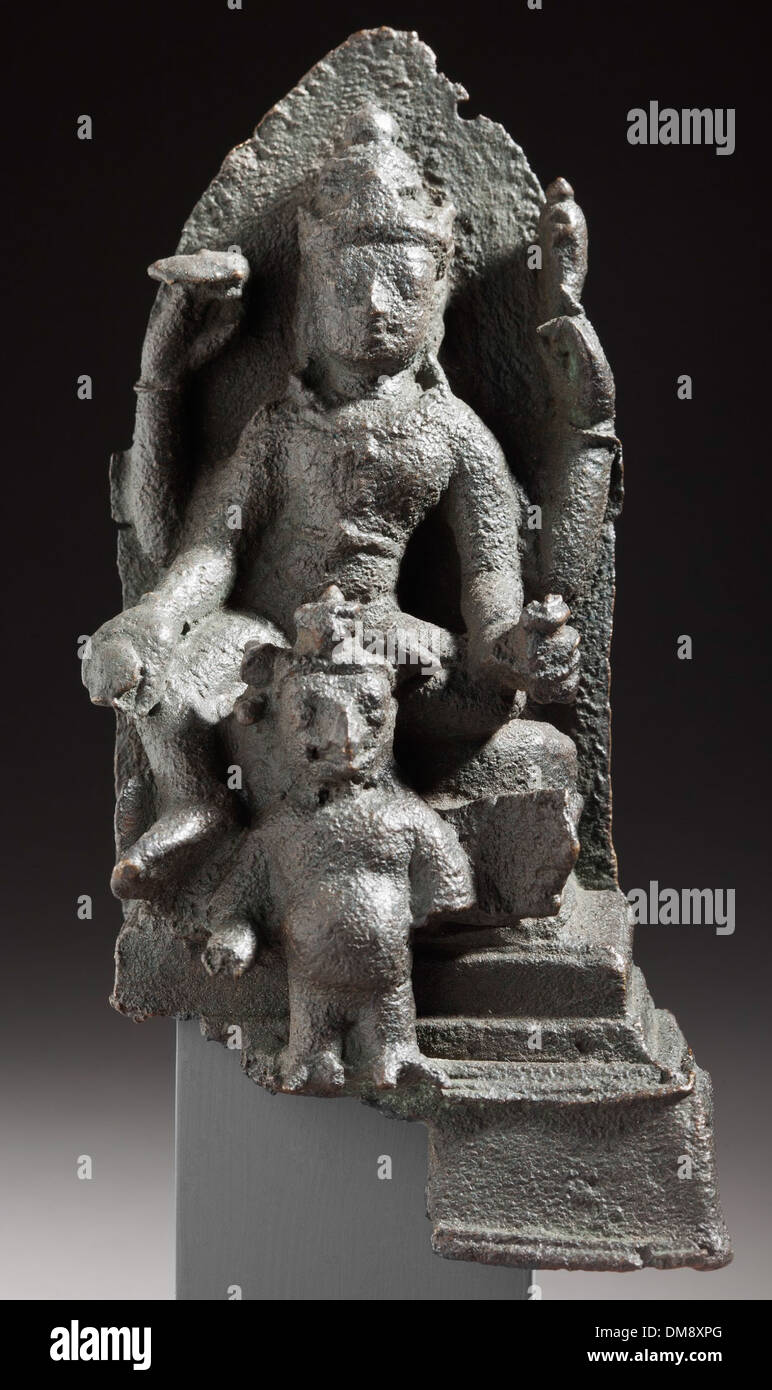 This artwork depicts Vishnu, the Hindu god, seated on his mount Garuda ...
