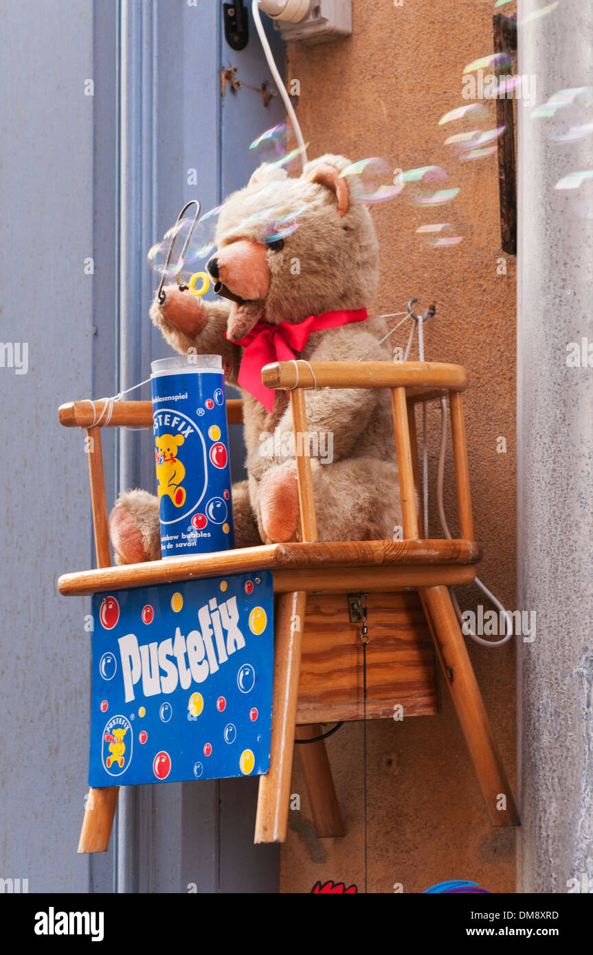 Teddy bear blowing soap bubbles hi-res stock photography and images - Alamy