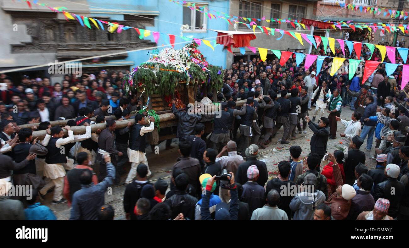 Kathmandu, Nepal. 12th Dec, 2013. Devotees carry an idol of goddess ...