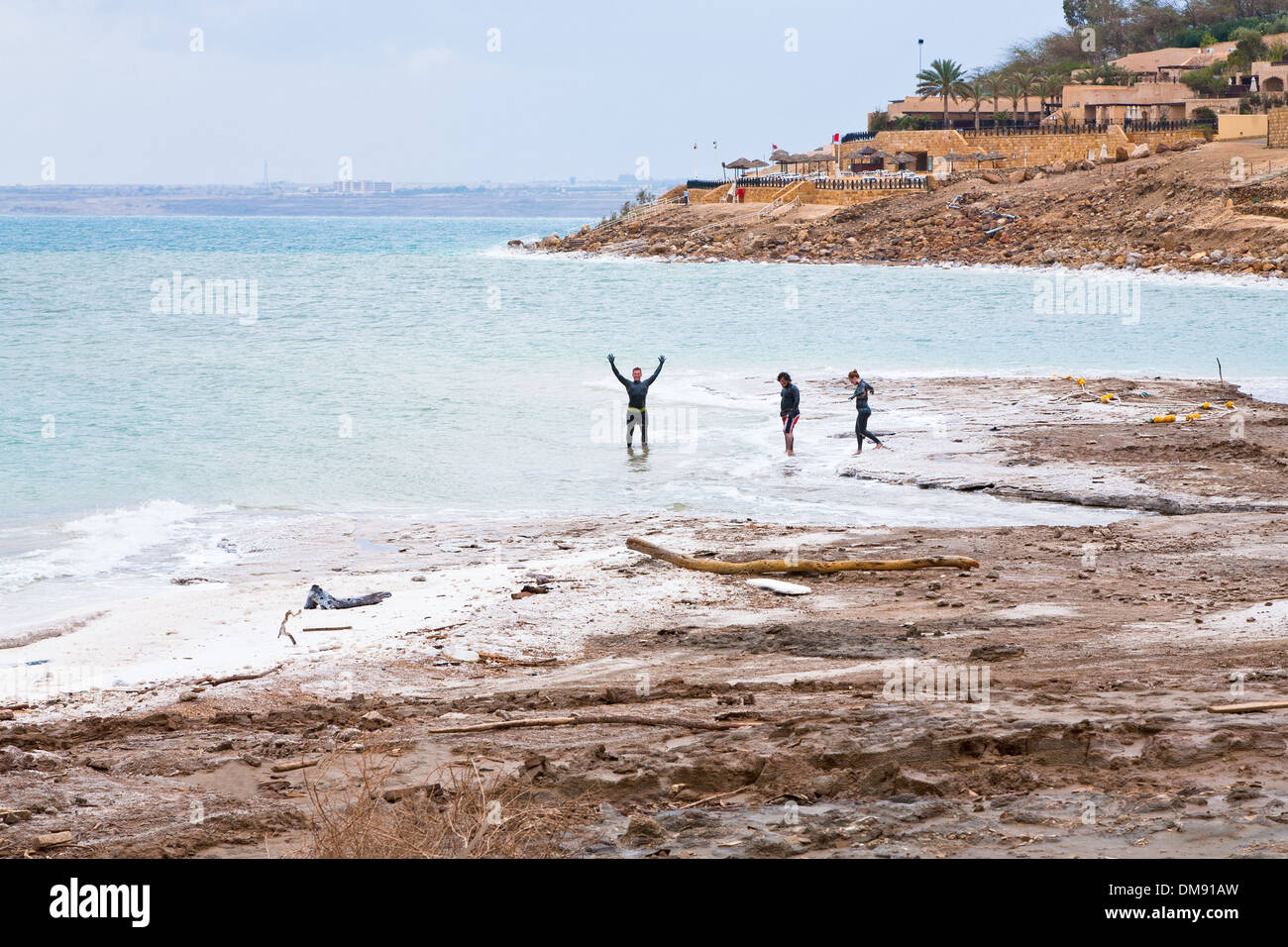 people in mineral mud in Dead Sea, Jordan Stock Photo - Alamy