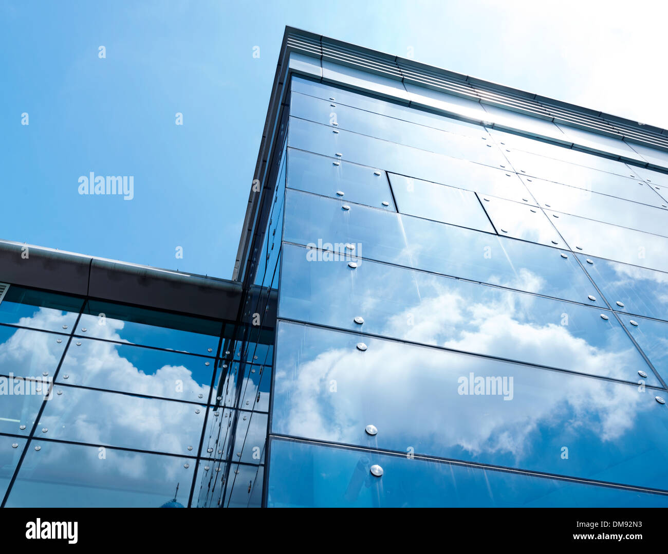 Modern business building with sky reflection Stock Photo - Alamy