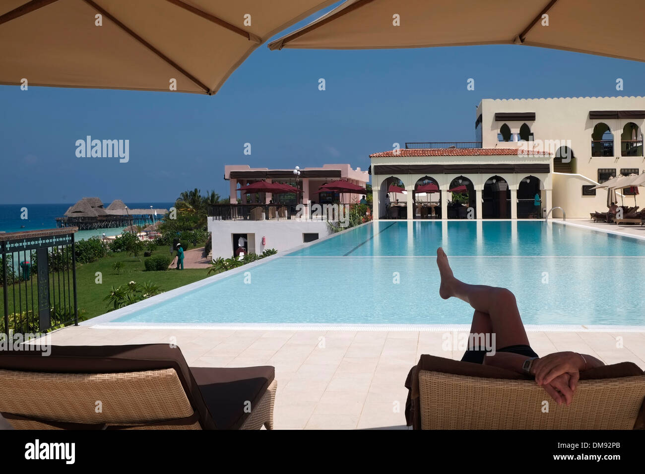 The swimming pool in Hideaway of Nungwi Resort hotel on the north-west ...