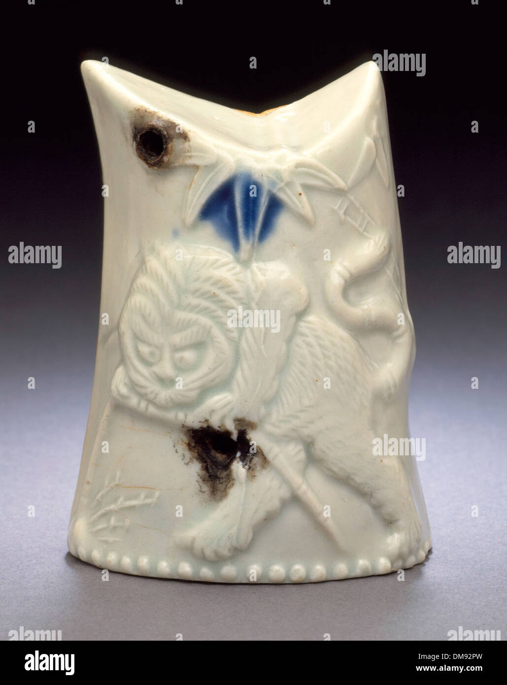 This *suiteki*, or water dropper, is designed in the shape of bamboo ...