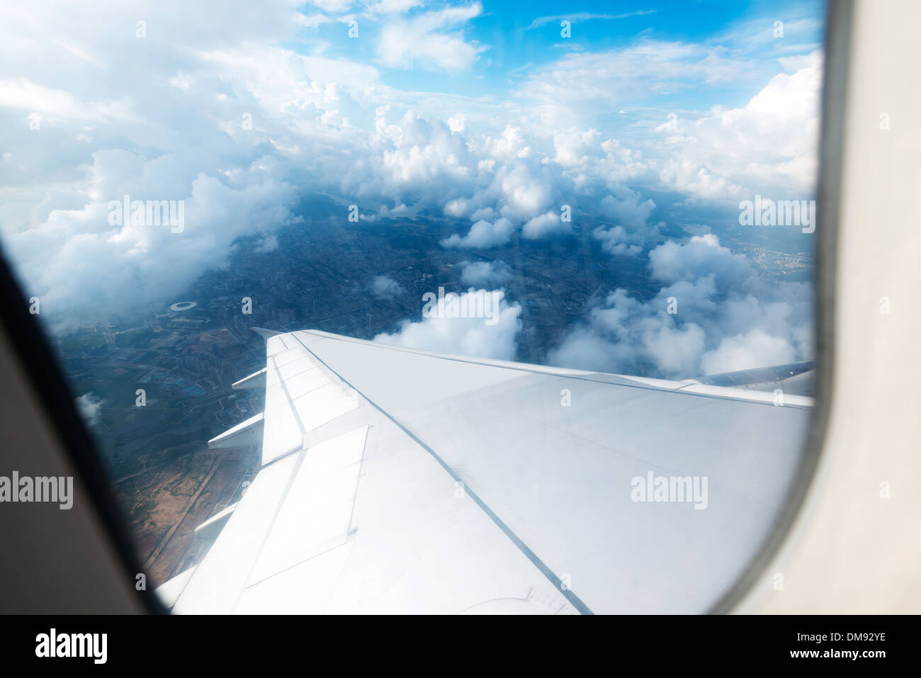 Looking through window aircraft during flight in wing with a nice blue ...