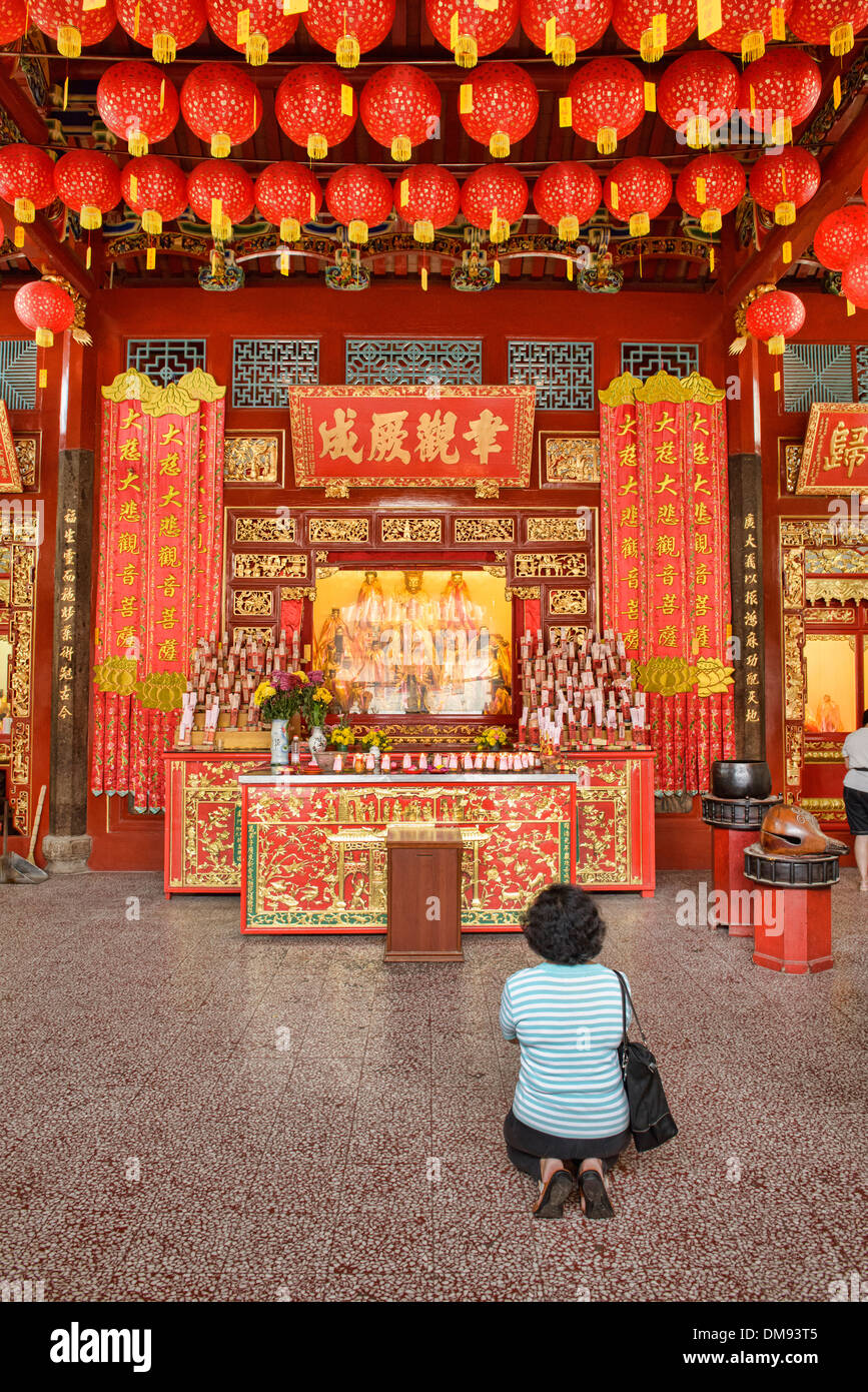 praying in Kong Hock Keong Shrine in Georgetown in Penang, Malaysia ...