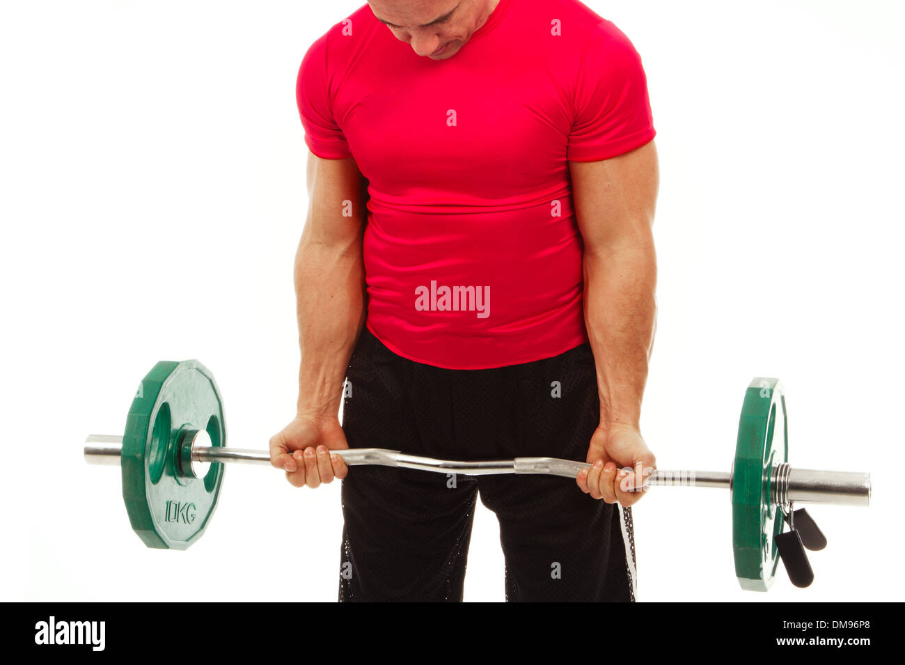 Closeup of a muscular young man lifting weights, isolated on white ...