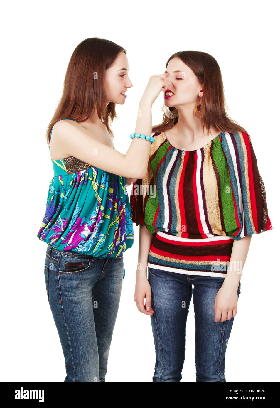 Two young women arguing, isolated on white background Stock Photo - Alamy